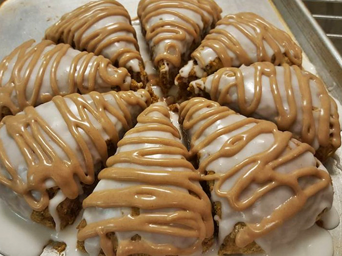 Scones drizzled with such precision they could make a pastry chef blush. These triangular treats aren't just baked—they're sculpted with sweet intention.