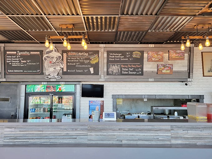 The menu board looms above like the scoreboard at Wrigley Field, presenting life's most important decision: beef, dog, or combo?