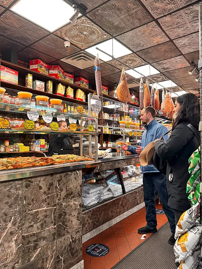 The deli case at Freddy's is like a museum where everything is edible—Italian meats, cheeses, and prepared foods beckon from behind glass.