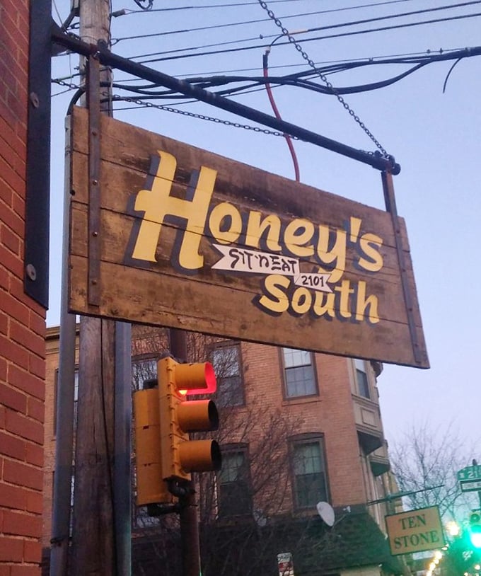 The South Philly location announces itself with rustic charm – a wooden sign that promises the same delicious experience with a different zip code.