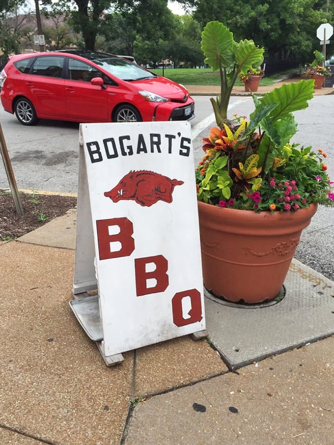 This sidewalk sign doesn't just announce a restaurant—it's a promise of porcine pleasure that's drawn barbecue pilgrims from across the country.