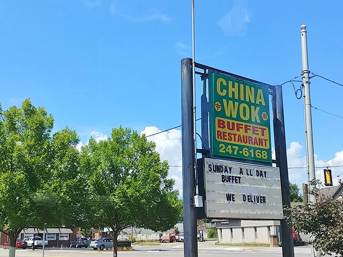 The roadside sign stands tall against Tennessee blue skies, a beacon for hungry travelers and locals alike seeking buffet satisfaction. 