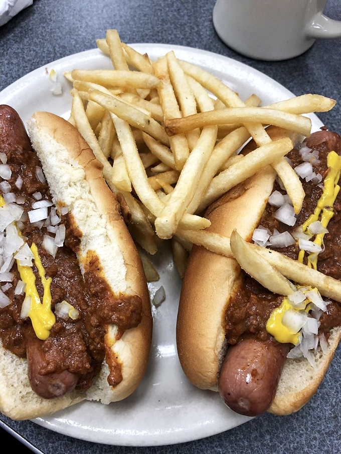 Coney dogs: proof that breakfast places know lunch too. These chili-smothered beauties with mustard and onions demand a stack of napkins.