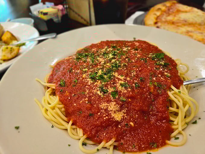 Spaghetti swimming in a sea of vibrant marinara—simple, honest food that reminds you why Italian cuisine conquered the world.