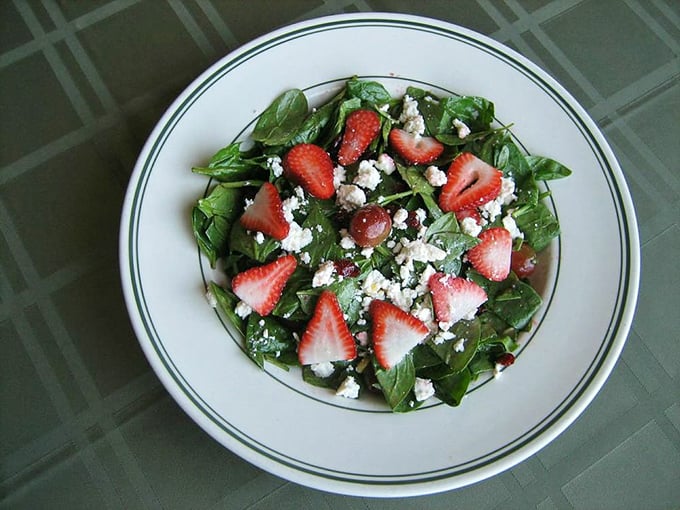 A spinach salad that makes eating greens feel like a reward, not a punishment. Those strawberries and feta create flavor fireworks in every bite.