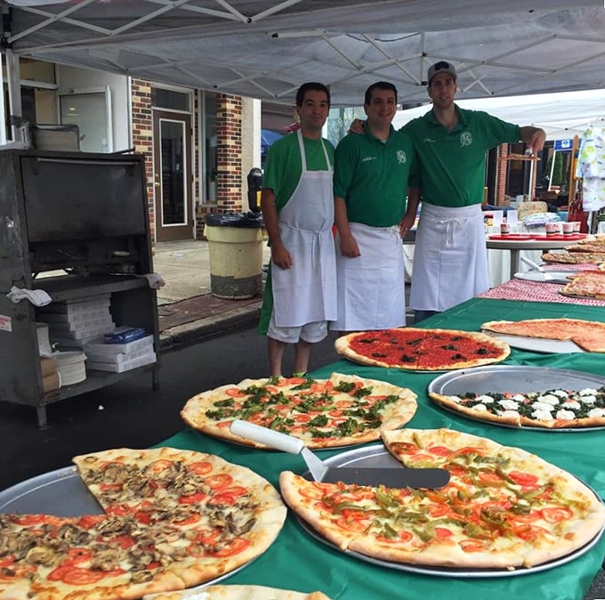 The green team ready to serve up happiness – these guys know their way around a pizza paddle.