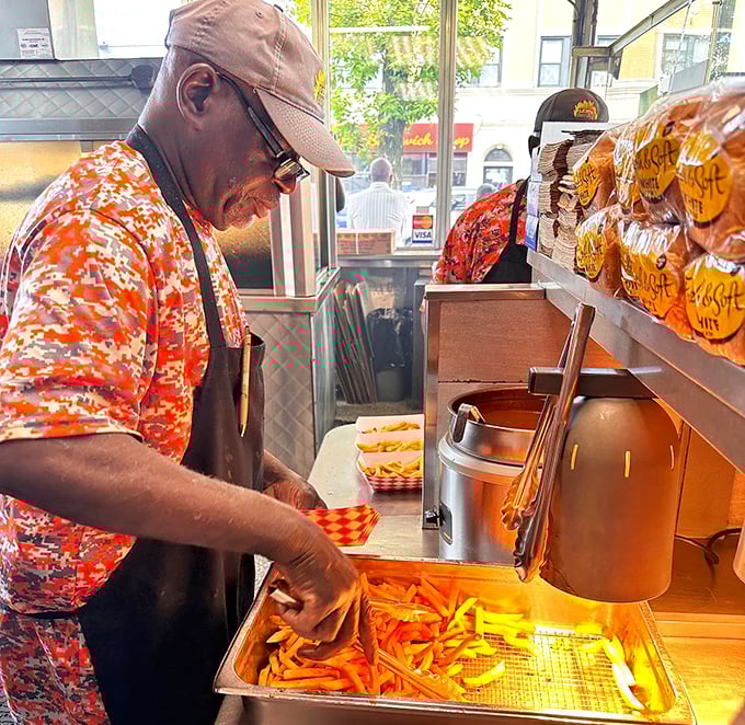 Skilled hands that know exactly how long those fries need to swim in hot oil—the unsung heroes behind perfect barbecue sides.
