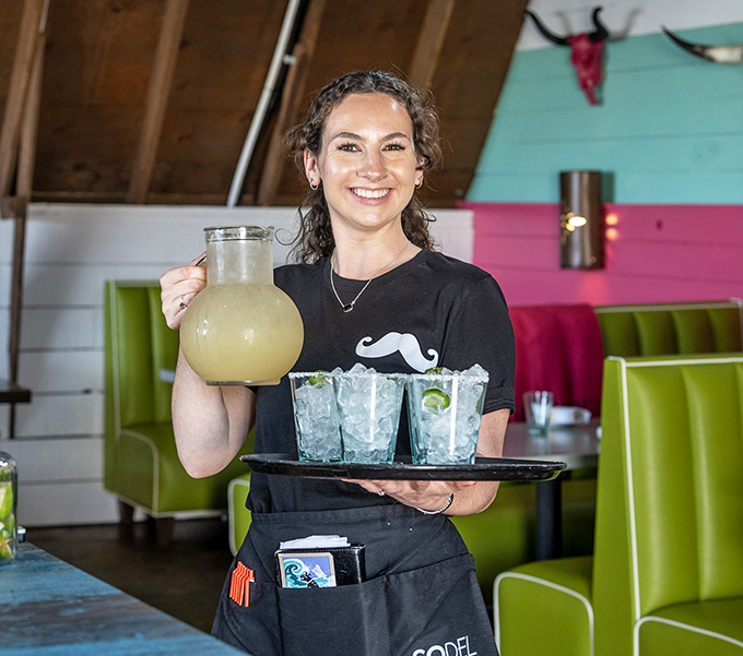 Margaritas delivered with a smile—because the only thing better than perfect lime-to-tequila ratio is the genuine hospitality that comes with it.