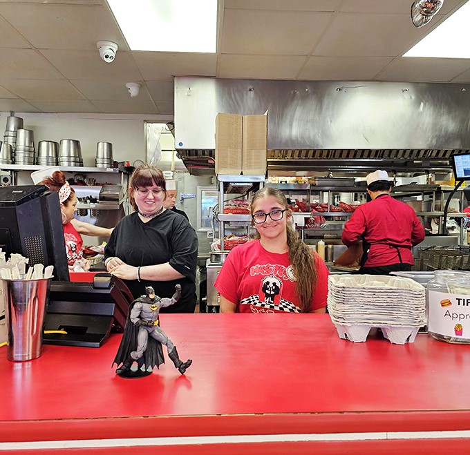 The staff at Nifty Fifty's doesn't just serve food—they're memory-makers in red shirts, guardians of the great American diner tradition.