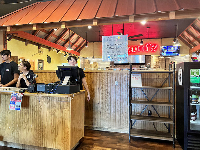 Where the magic happens—the heart of Marzoni's operation. Those staff members aren't just working; they're orchestrating your next favorite meal.