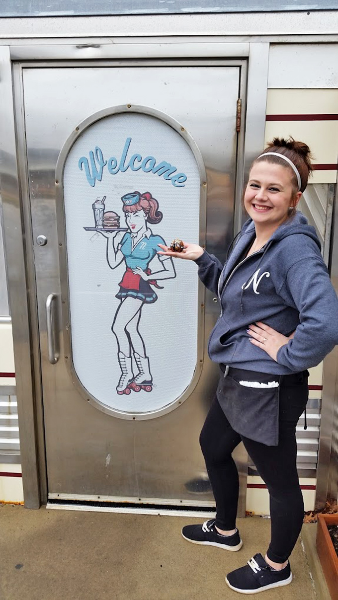 The welcome sign featuring a roller-skating waitress sets the tone – this place serves nostalgia alongside its famous home cooking.