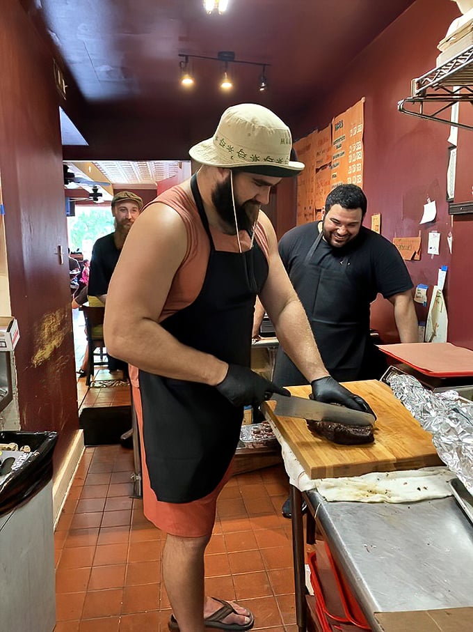 Craftsmanship in action: The careful slicing of brisket requires the focus of a surgeon and the respect of someone handling liquid gold.