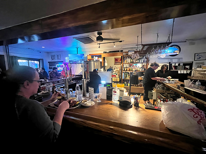 Where the magic happens. The kitchen crew orchestrates the transformation from raw ingredients to plate-licking perfection with practiced precision.