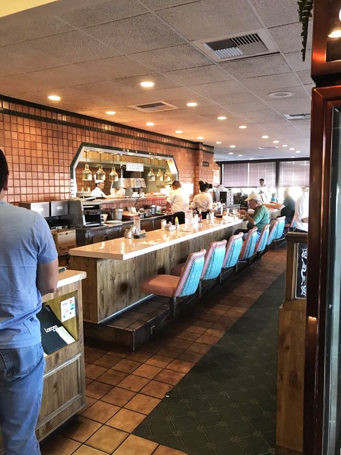 Where magic happens—the counter seating offers front-row tickets to the culinary show. Breakfast theater at its finest.