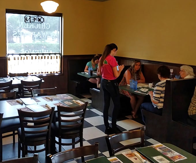 The server-customer dance that's been perfected over countless plates of eggs and refills of coffee. Hospitality isn't trained here—it's inherited.