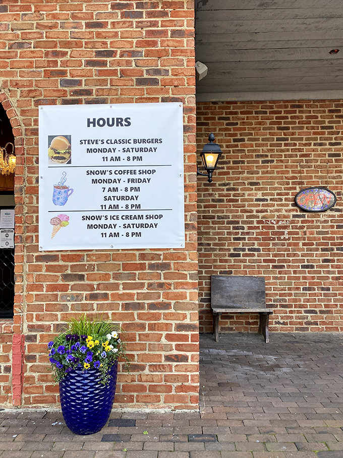 Hours posted like a promise. Six days a week of burger bliss, with Snow's Coffee Shop opening early for the breakfast crowd.