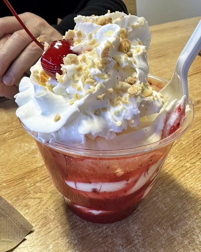 This strawberry sundae isn't just dessert—it's a structural marvel of whipped cream, fruit, and childhood dreams realized.