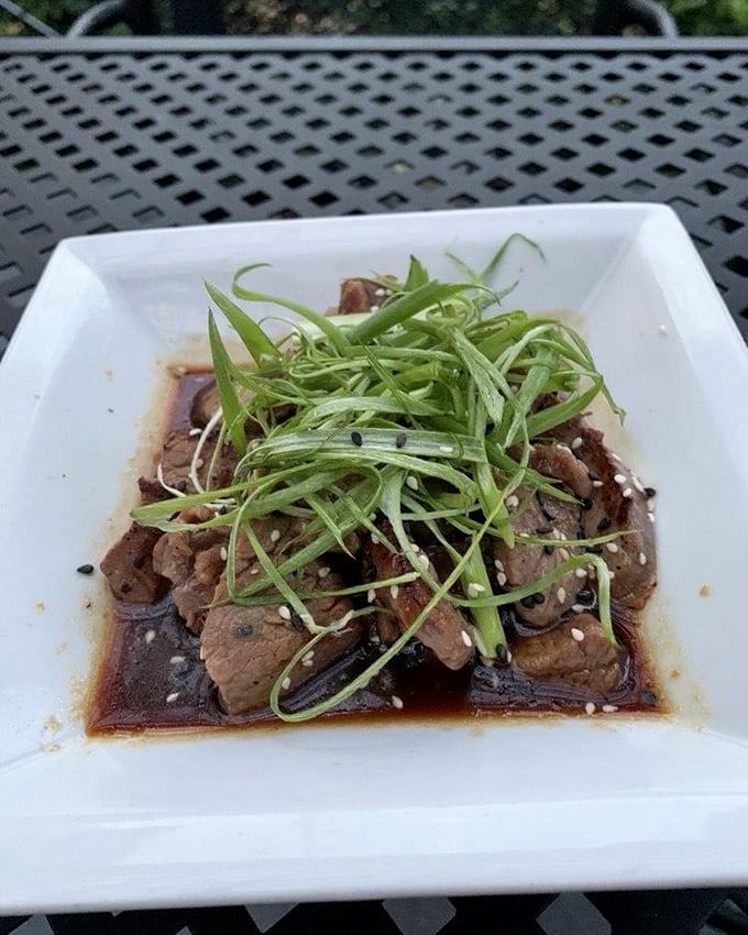 The Teriyaki Tenderloin appetizer offers a preview of beef excellence to come—tender morsels glazed with umami-rich sauce and topped with fresh scallions.