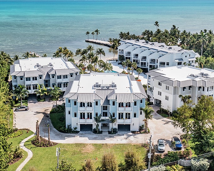 White buildings gleam against turquoise waters, creating the postcard-perfect scenes that fill your friends' Instagram feeds with envy.