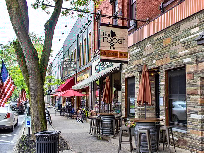 The Roost's outdoor barrel tables create that perfect casual vibe where afternoon drinks accidentally become evening conversations about life's big questions.