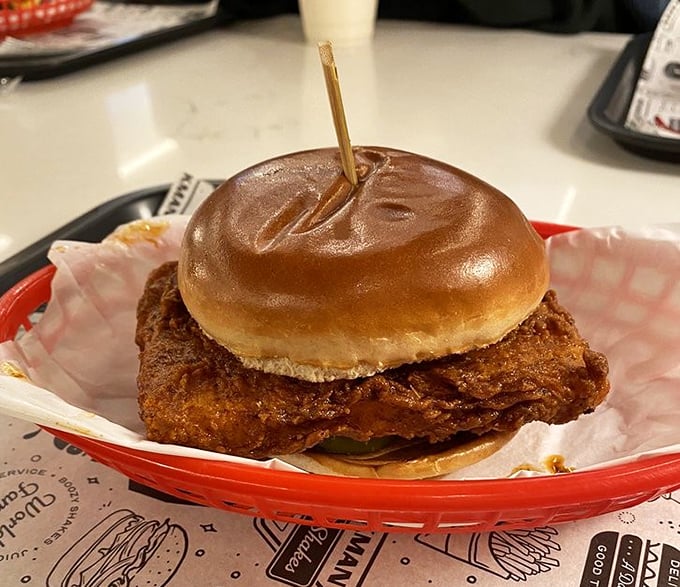 This isn't just a chicken sandwich; it's architectural perfection with a golden-fried foundation that makes you forget other sandwiches exist.