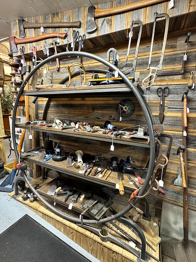 This wall of vintage tools isn't just for handymen—it's an industrial art installation where function meets rustic design history.
