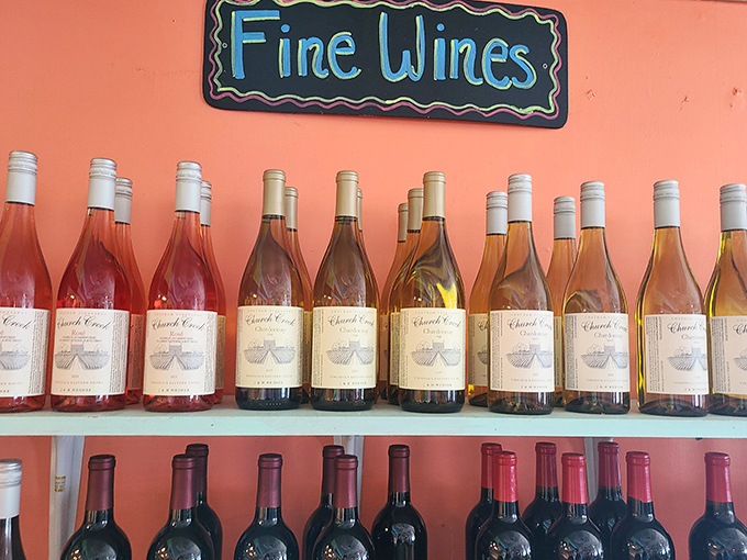 The wine selection stands at attention, ready to complement your seafood feast. These bottles aren't just drinks—they're supporting actors in your dining experience.