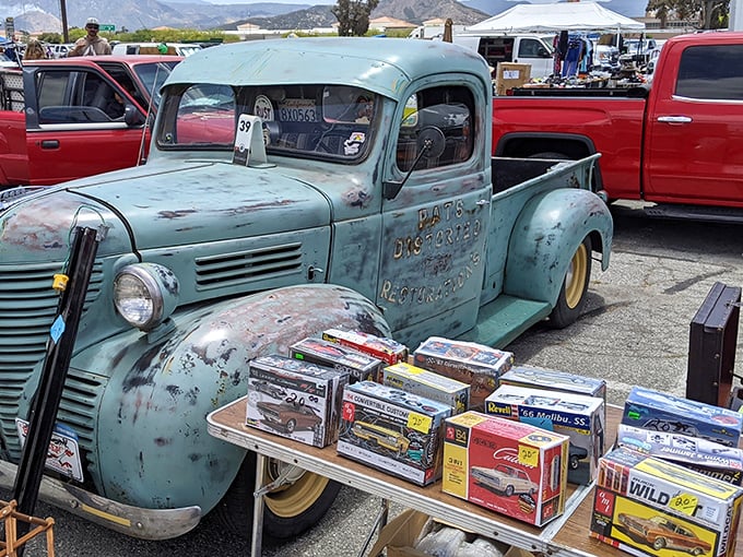 Detroit's finest enjoying retirement in the California sun. This patina-perfect pickup isn't just transportation—it's rolling automotive history with model cars to match.