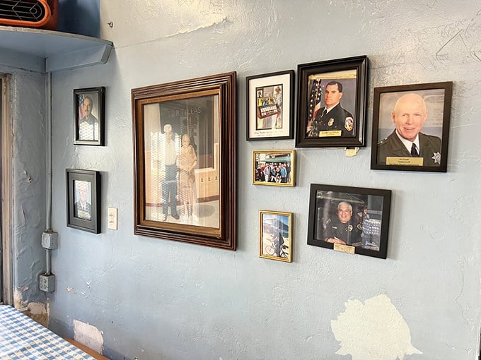 The wall of memories speaks volumes about community connections. These aren't just decorations—they're a visual guestbook of satisfied customers and local history.