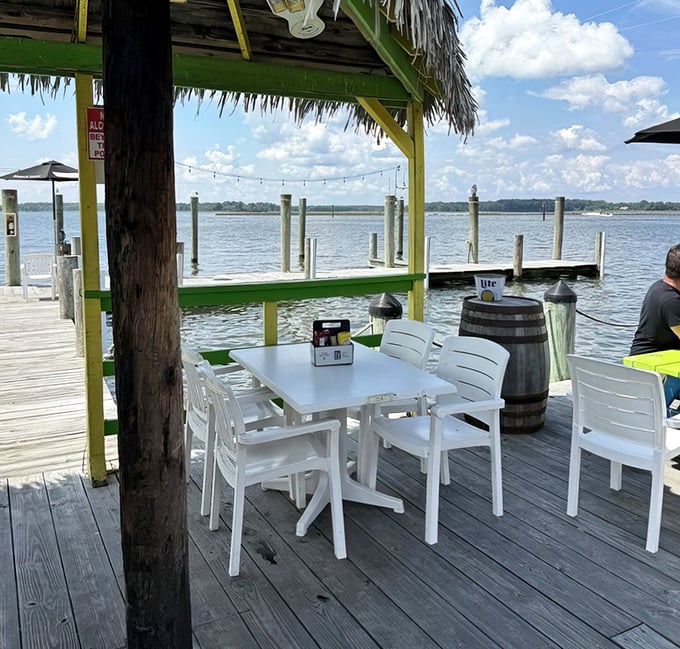 Waterfront dining with a thatched roof bar—just casual enough that you don't have to pretend you know which fork to use.