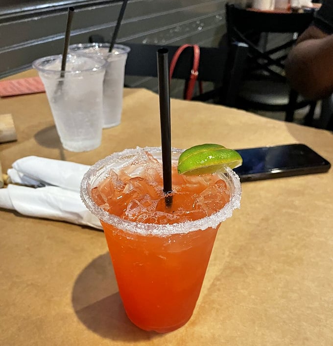 That watermelon margarita with the salt rim looks like summer decided to stay for one more round.