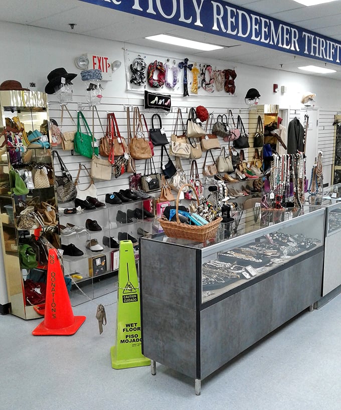 The accessories wall—where handbags, jewelry, and knickknacks create a treasure hunter's paradise that would make Indiana Jones switch careers.