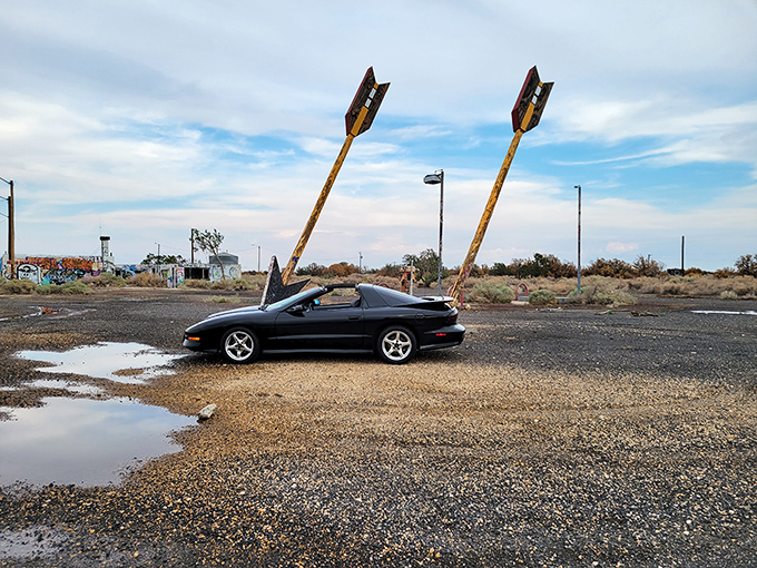 Classic cars and classic roadside kitsch—a match made in highway heaven that never fails to inspire the perfect road trip photo.