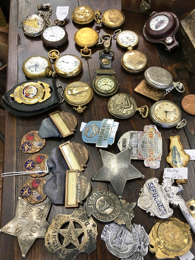 Time literally stands still in this collection of pocket watches and badges, each one ticking with stories of their former owners.