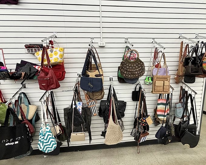 The handbag wall—where designer knockoffs and genuine vintage finds hang side by side in democratic fashion harmony.