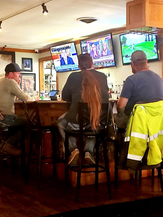 The bar area offers front-row seats to both sports commentary and local gossip – sometimes it's hard to tell which provides better entertainment.