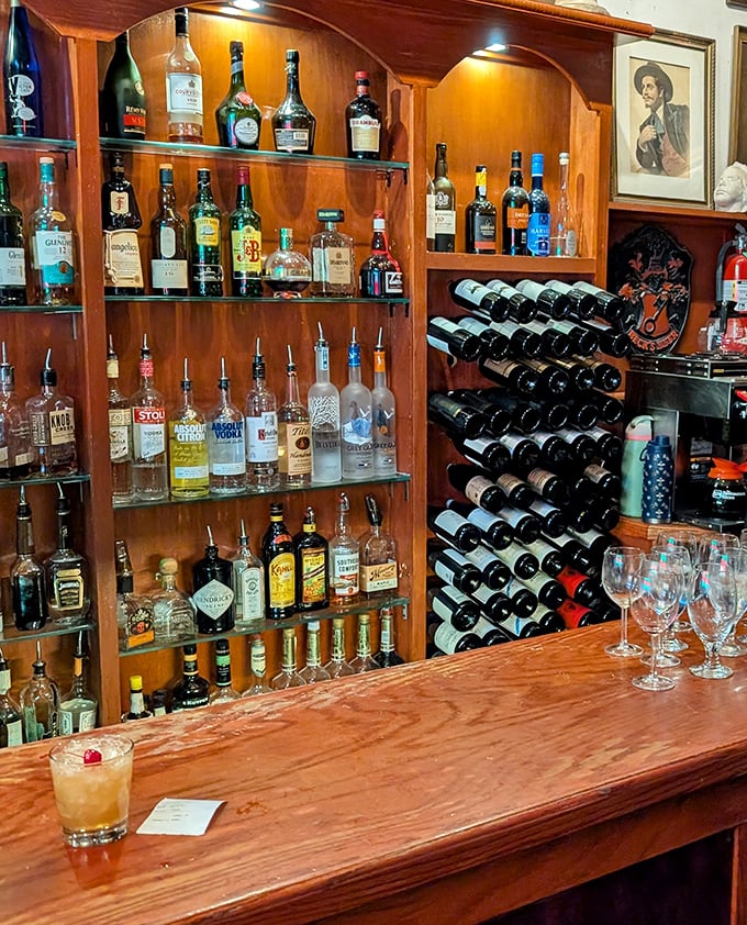 The bar doesn't just stock spirits – it showcases them like a museum of liquid art, ready to complement your meal with the perfect pairing.