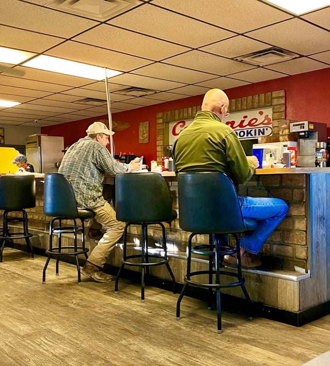 The counter is where regulars become family and first-timers become regulars. Coffee tastes better when served with a side of local wisdom.