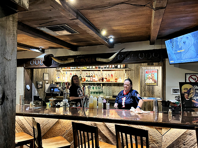 The bar balances rustic charm with the promise of libations that complement rather than compete with the star of the show—the meat.