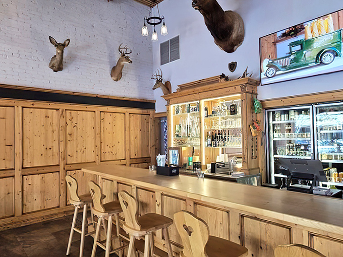 A hunting lodge meets beer hall at this rustic bar, where mounted deer heads oversee the pouring of perfect pints beneath wooden beams.