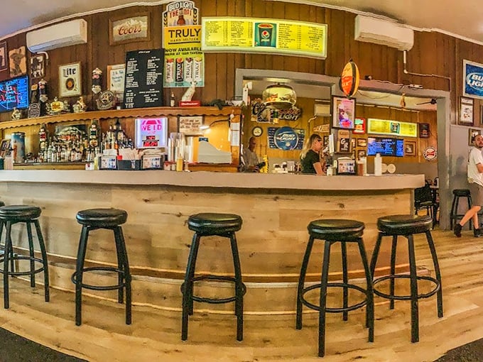 A bar that tells stories through its worn wood and neon signs – where locals have been solving the world's problems one beer at a time.