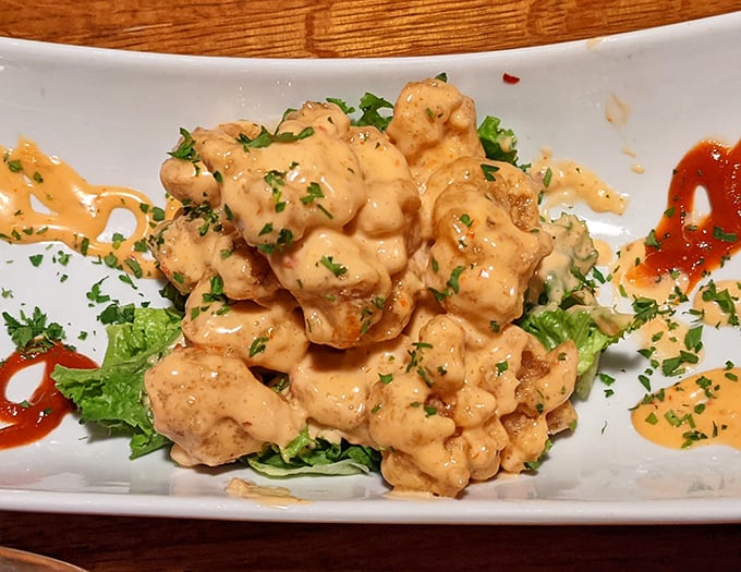 Boom Boom Shrimp that lives up to its explosive name—crispy, saucy bites that disappear faster than your resolution to "just have a salad."