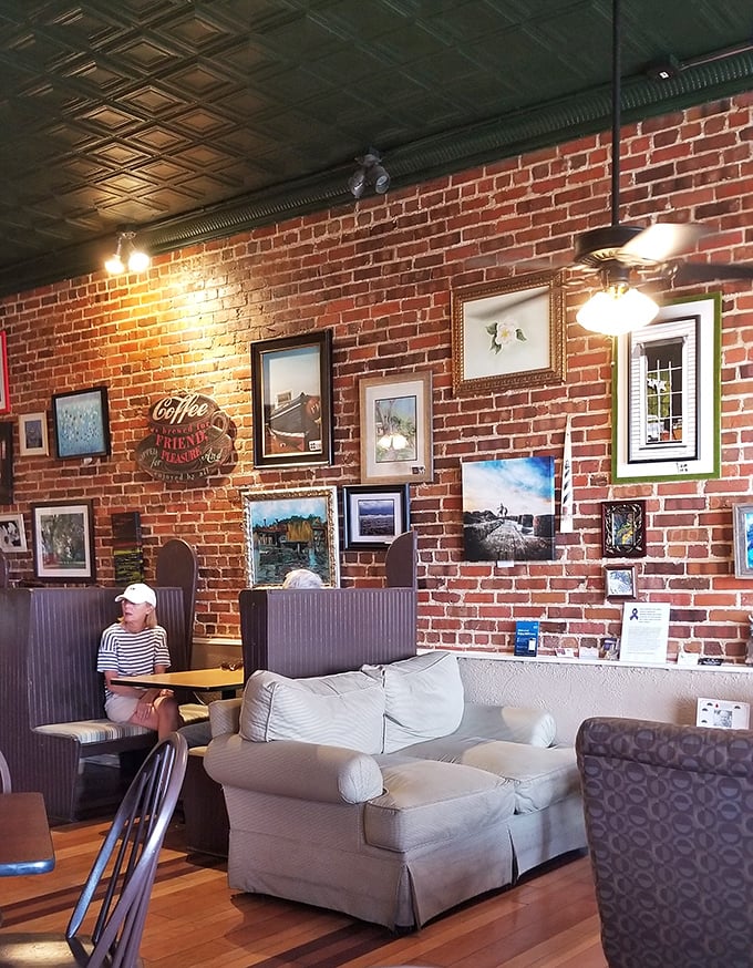 That exposed brick wall gallery tells stories while you eat. The comfy booth seating invites you to stay awhile—and order dessert.
