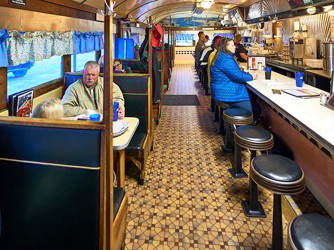 The social architecture of diner life—where strangers become neighbors over coffee refills and shared condiment caddies.