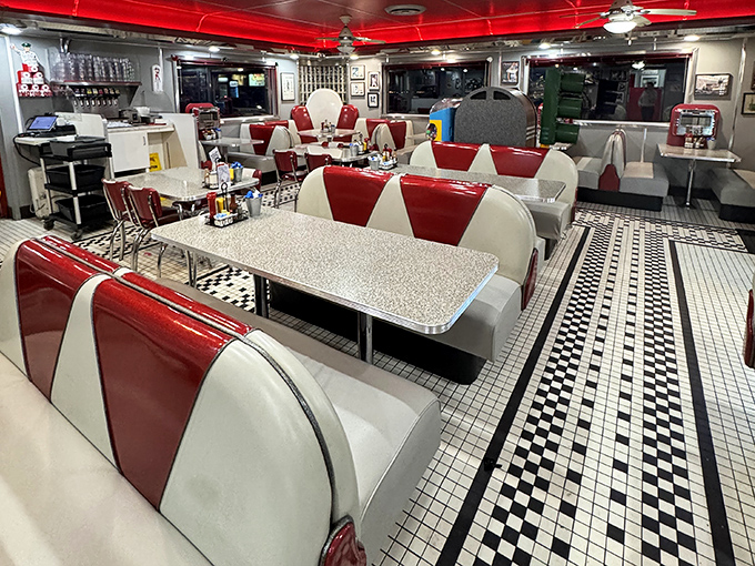 The checkerboard floor and pristine red and white booths aren't just seating – they're front-row tickets to the greatest show on earth: breakfast for dinner.