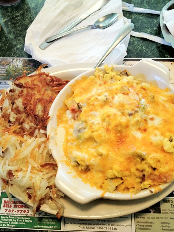 This cheesy masterpiece with crispy hashbrowns on the side isn't just breakfast—it's edible therapy that costs less than a session with your therapist.