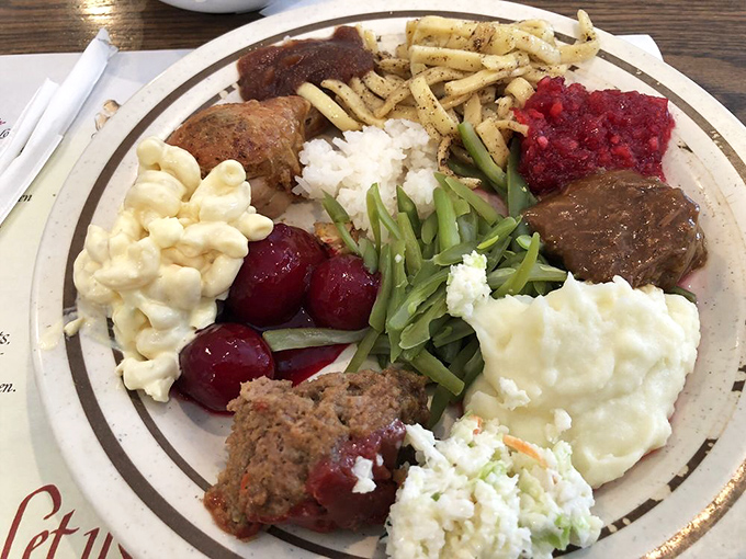The buffet plate that tells the story of someone who came hungry and left with zero regrets and possibly a nap scheduled.