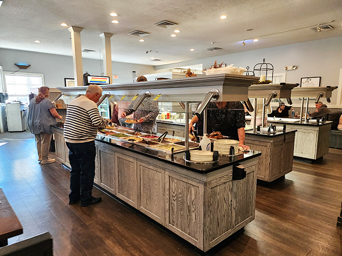 The buffet line—where decisions get tough and plates get full. Each steam tray promises something worth saving room for.