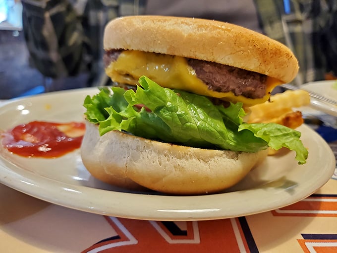 A burger that doesn't need a fancy name or artisanal pretense—just honest beef meeting honest bread in perfect harmony.