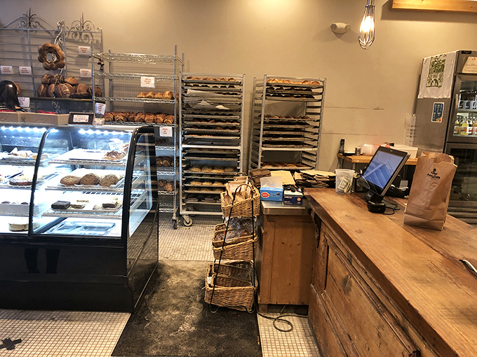 The heart of the operation – where transactions happen but conversations about bread are always free. The wooden counter has heard countless "Oh my goodness" reactions.